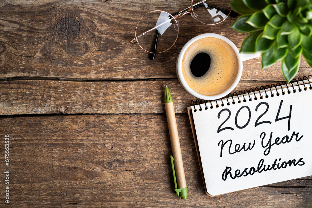 New year resolutions 2024 on desk. 2024 goals list with notebook ...