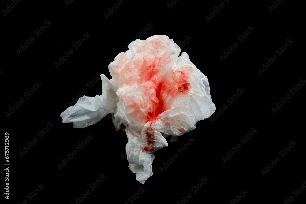 white tissue with blood clots with dark background. white tissue used ...