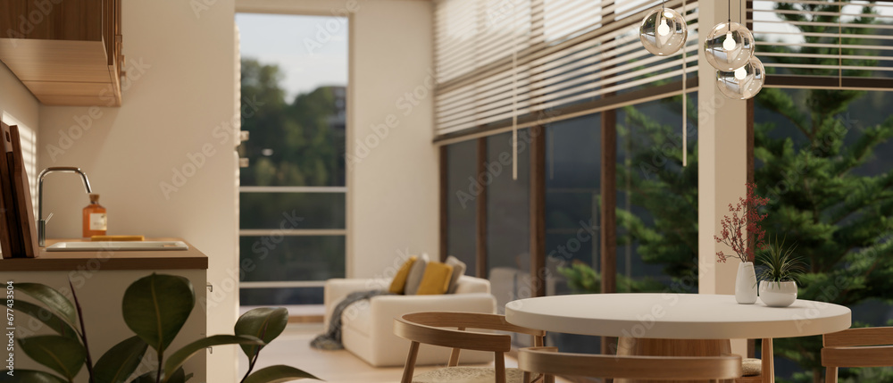 Side view of a round dining table in a modern Scandinavian spacious ...