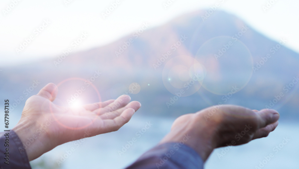 Hand receive light background. With open hands gesture of person on top ...