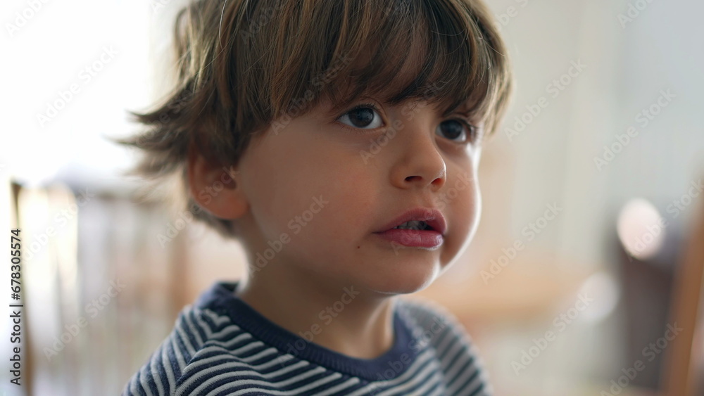Child chewing food with open wide mouth, close-up face of little boy ...
