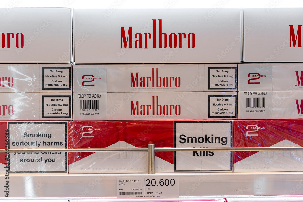 Cigarettes department at a duty free segment store with many big packs ...