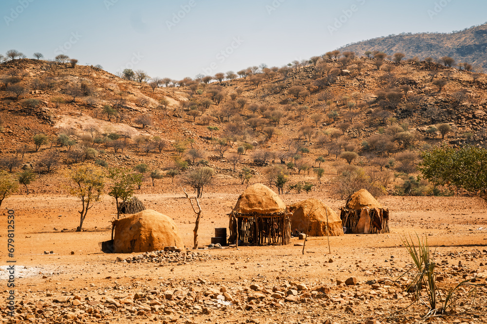 Traditional Himba village with mud and wood huts, north of Opuwo ...
