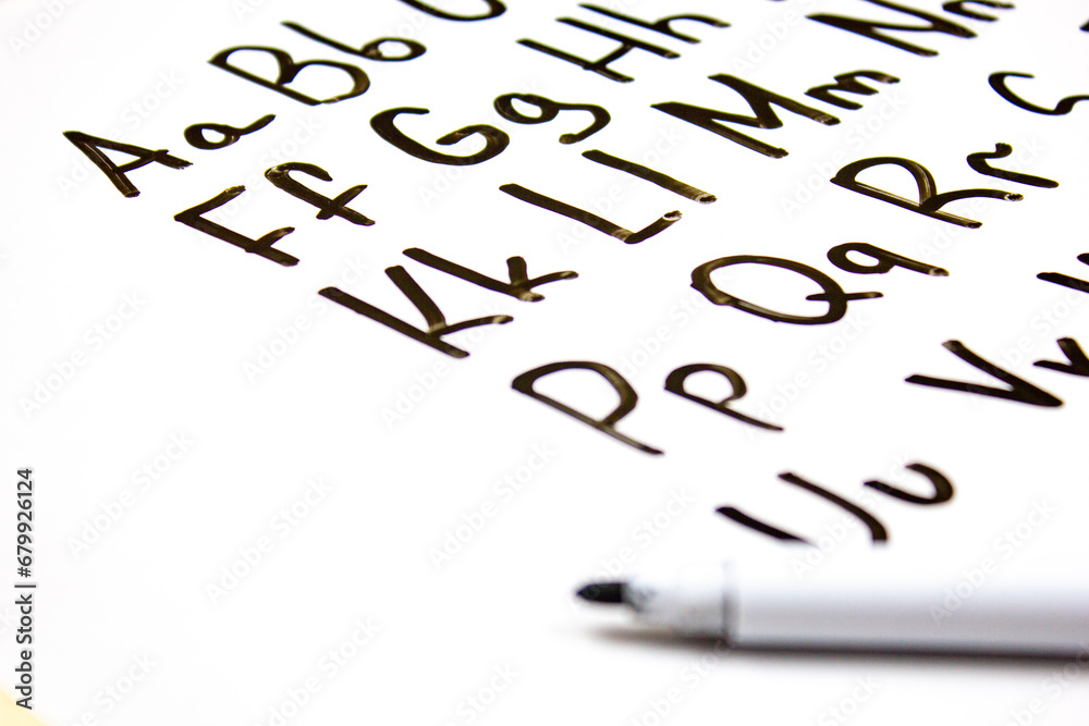 English alphabet, letters written with a marker on a blackboard ...