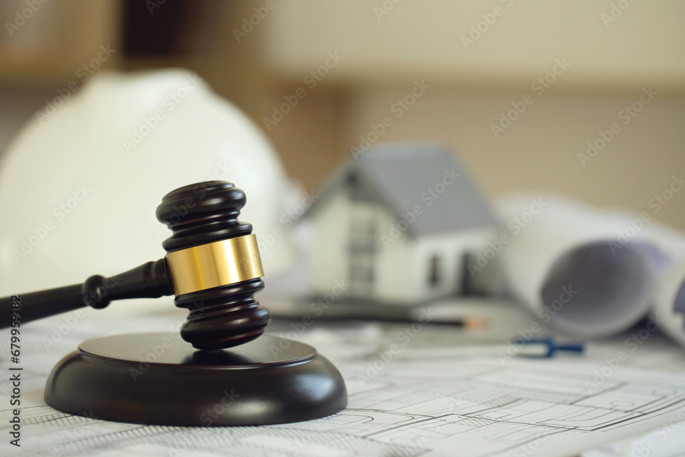 Labor and Construction law concept. judge gavel on building blueprint ...