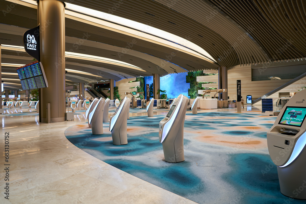 SINGAPORE - NOVEMBER 06, 2023: self check-in kiosks in Singapore Changi ...