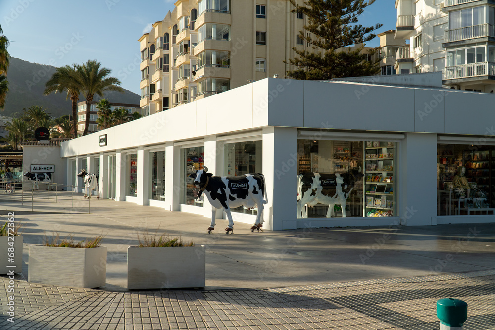 Ale Hop gift shop with symbolic cows figures in Playa de l'Albir. Albir ...