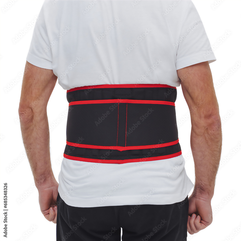 Lumbar brace on the human body isolated on a white background. Trauma ...