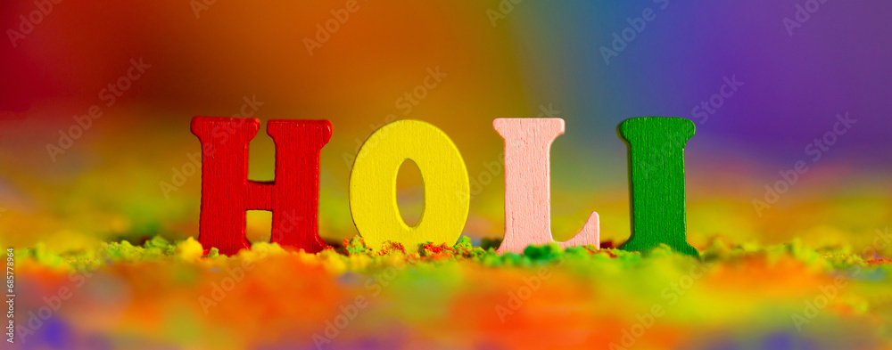 Happy Holi. Colorful background of multicolored gulal powder paints. A ...