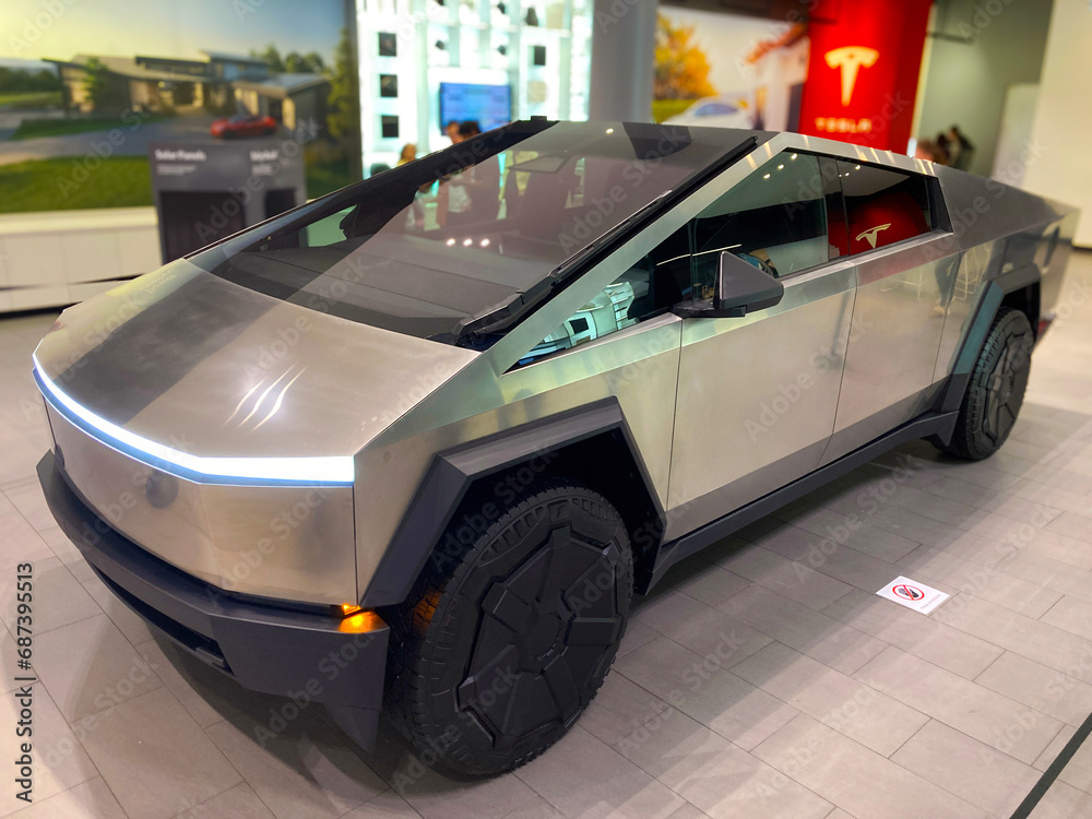 Front view of futuristic Tesla Cybertruck with angular design on ...