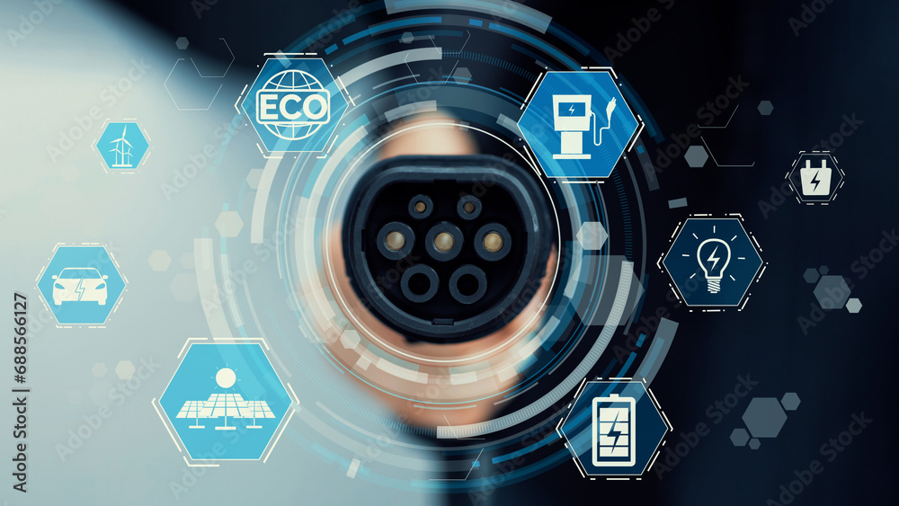 Focus EV charger pointing in front of camera display eco-friendly ...
