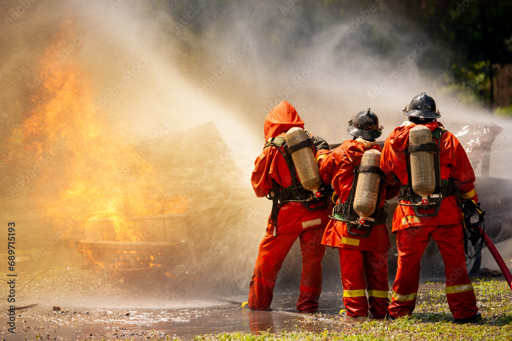 firefighter training fireman team use extinguish spraying fire car ...