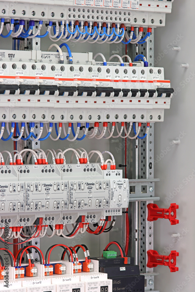 Electronic control modules for apartment automation are installed in an ...