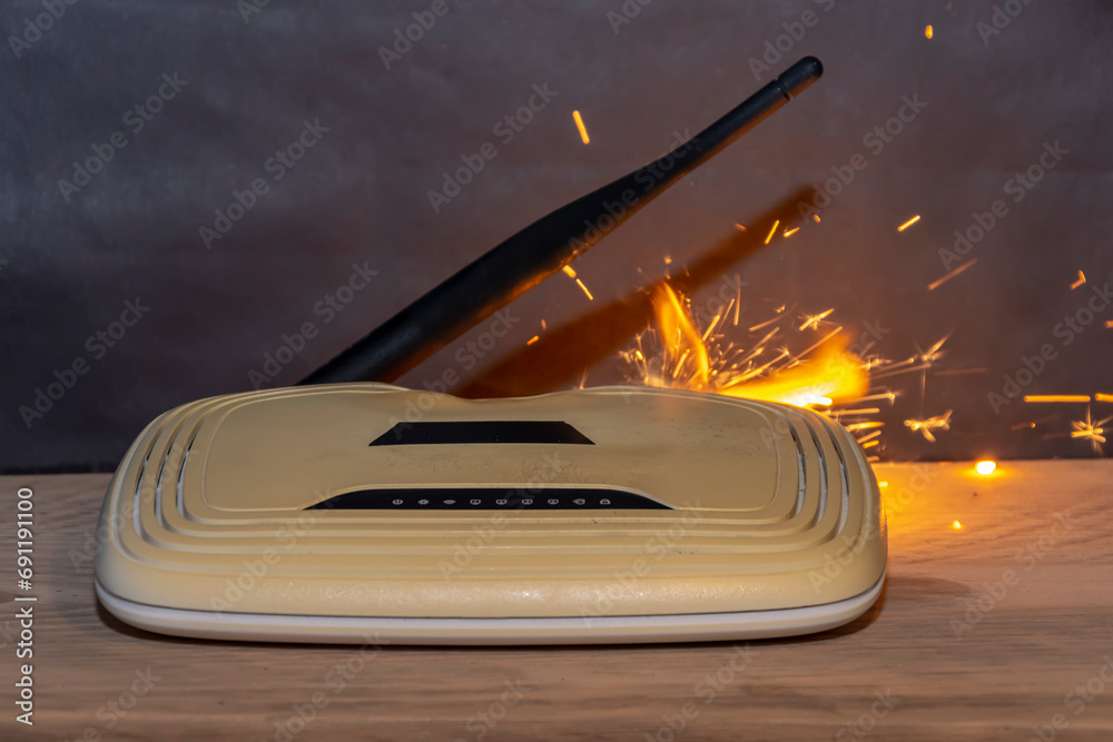Wi-fi router burns with fire from overheating and smoke on the dark ...
