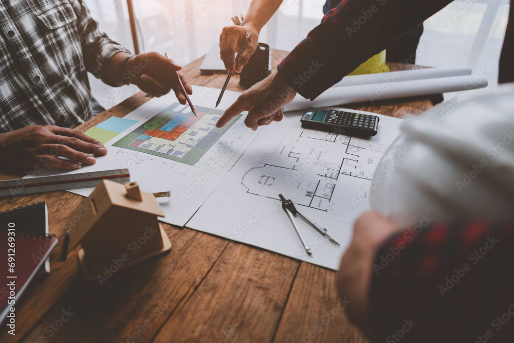 Meeting with business people, engineers and architects to present plans ...