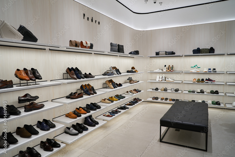 SINGAPORE - NOVEMBER 05, 2023: various footwear displayed inside Pedro ...