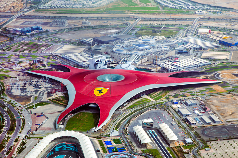 Aerial view of Ferrari World Park is the largest indoor amusement park in the world on a desert ...