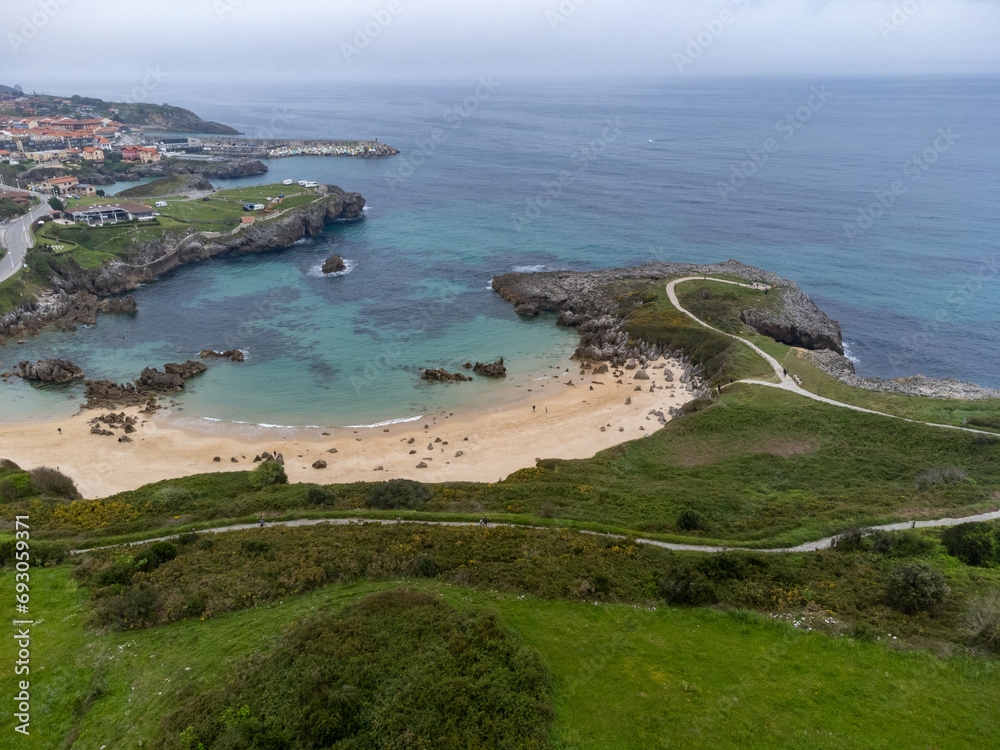 View on rocks on Playa de Toro in Llanes, Green coast of Asturias ...