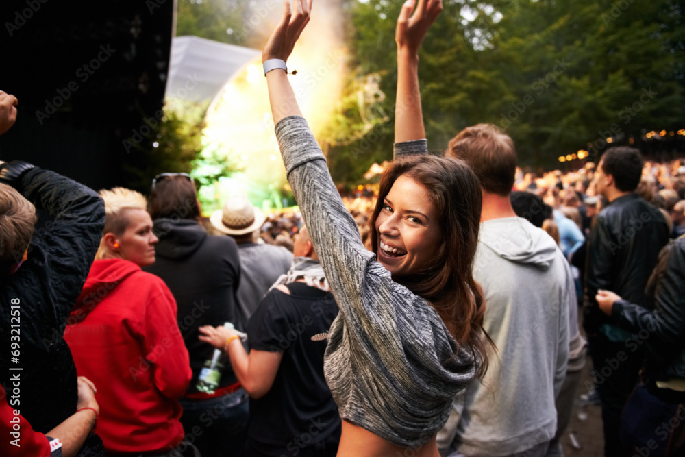 Happy woman, portrait and crowd in music festival for party, event or ...