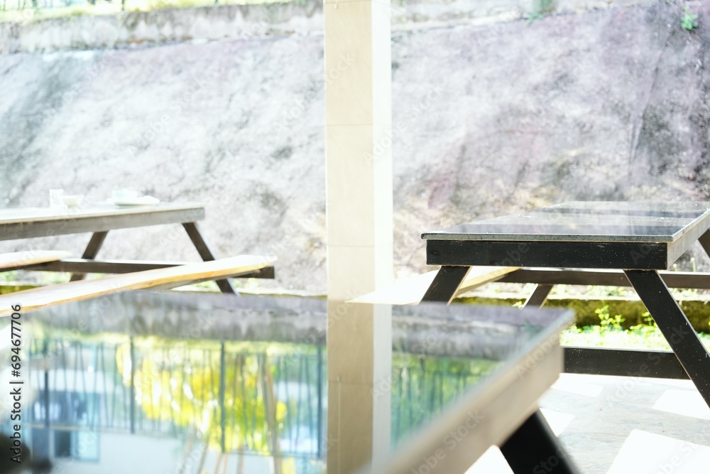 Line breakfast buffet in black granic table and bench ,chairs on the ...