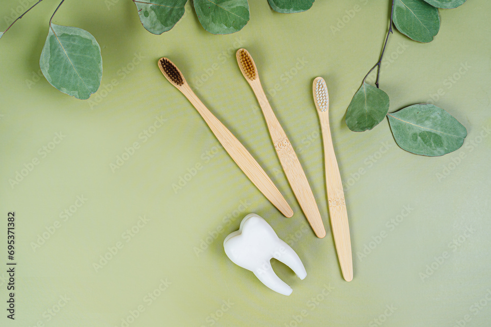 Tooth and eco tooth brushes on a beige background. Concept of dental ...