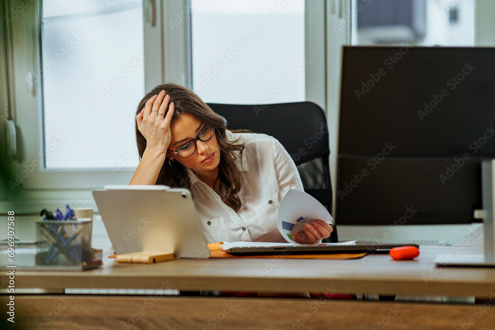Young intern is having difficulties with her new assignment, she looks ...
