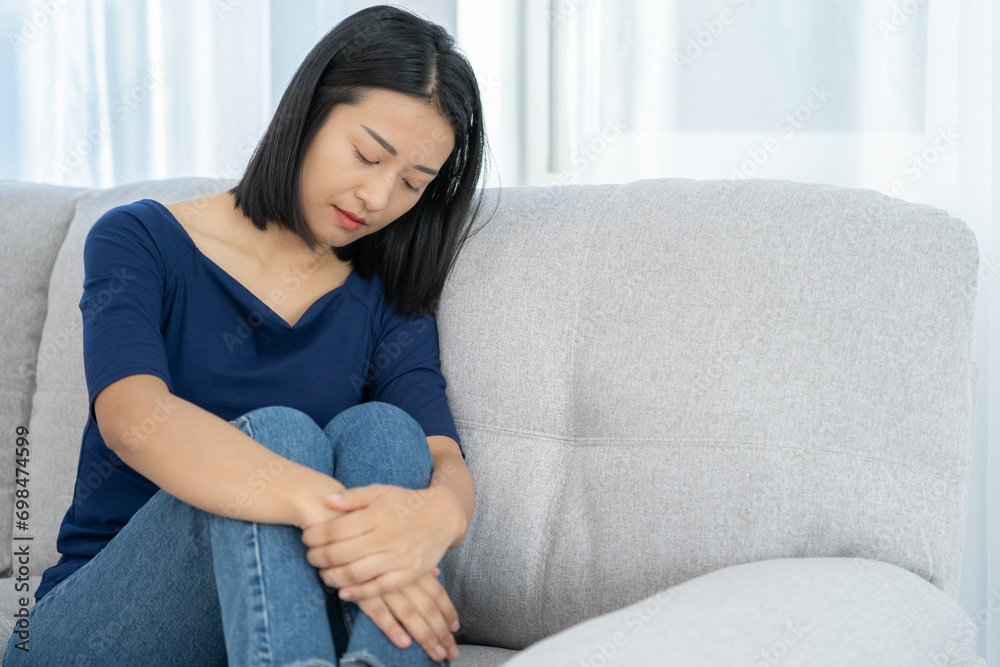 Depression and mental illness. Asian woman disappointed, sad after ...