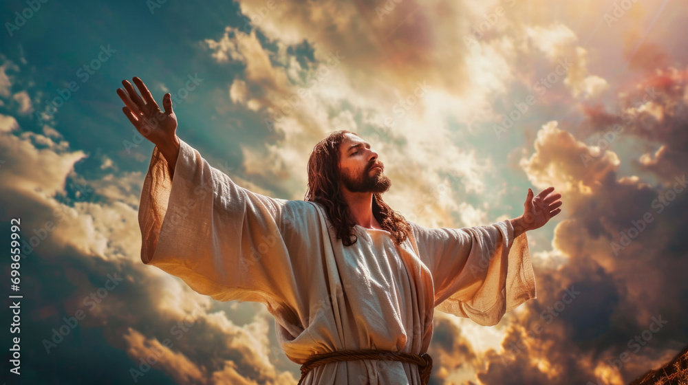 Jesus Christ with open arms against blue sky Stock Photo | Adobe Stock