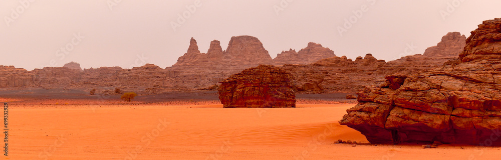 Sand dunes and rocks in the Sahara Desert, Algerian part in the Tadrart ...
