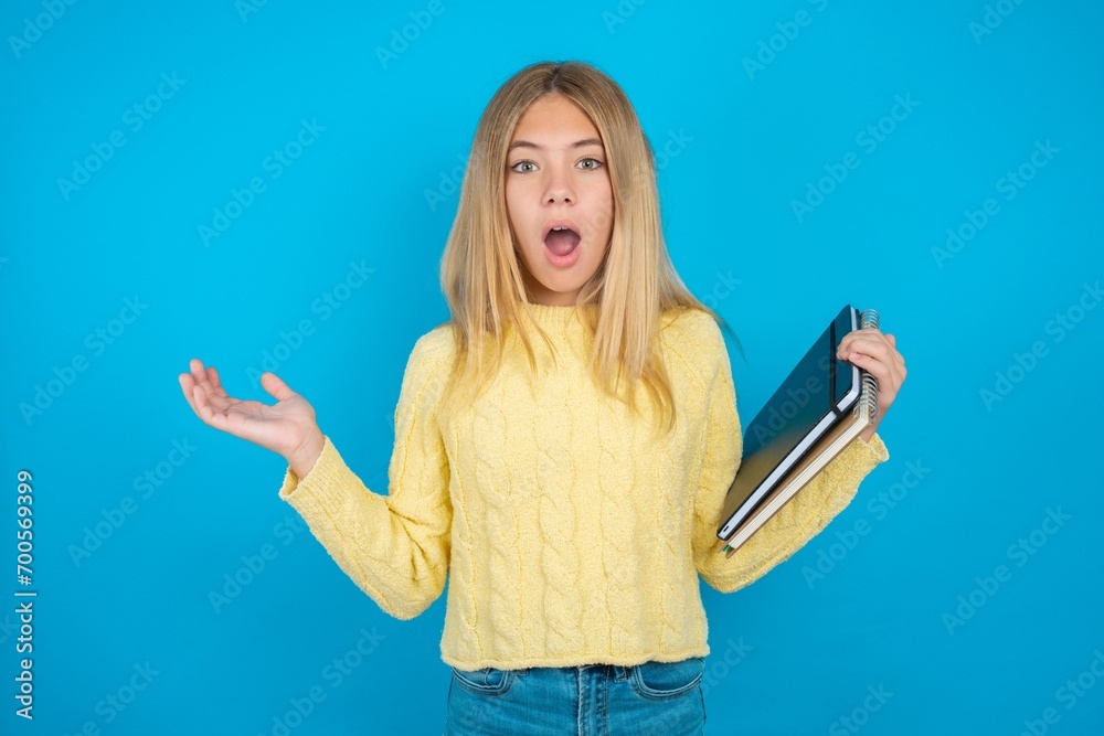Surprised terrified beautiful caucasian teen girl wearing yellow ...