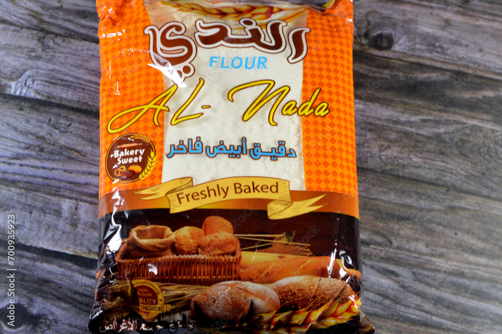 Cairo, Egypt, December 25 2023: Al Nada freshly baked flour, bakery sweet, Flour is a powder ...