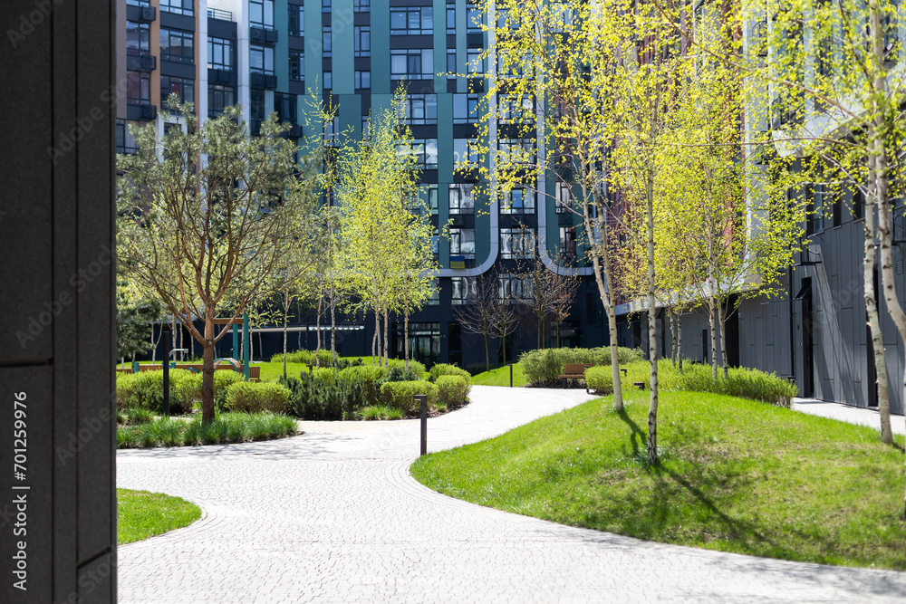 green spaces near an apartment building Stock Photo | Adobe Stock