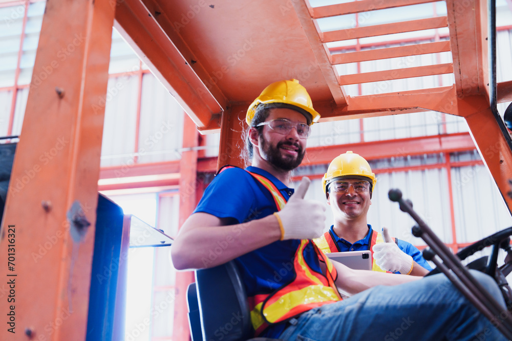 Logistics engineer and inspector showing thumbs up with teamwork ...
