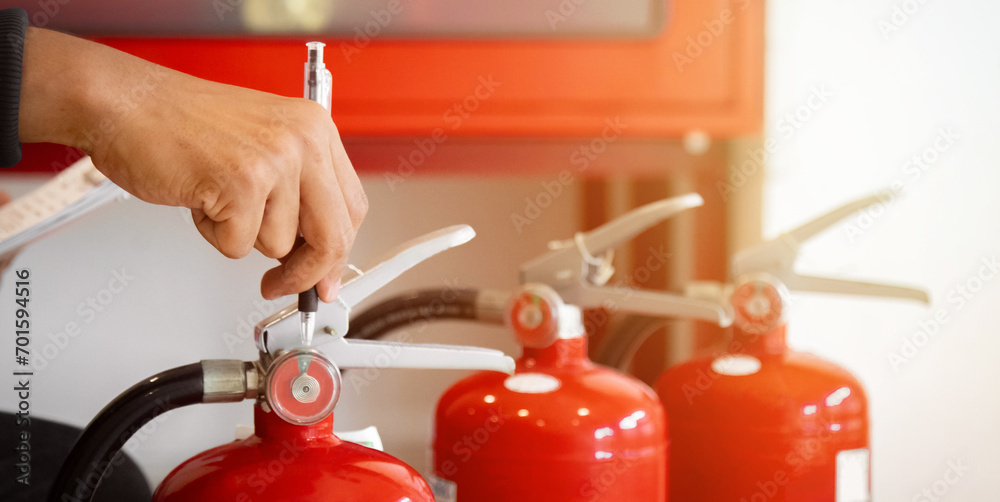 Engineer check fire suppression system,check fire extinguisher tank in ...