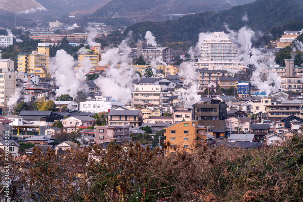 Beppu cityscape with Steam drifted from public hot spring baths and ...