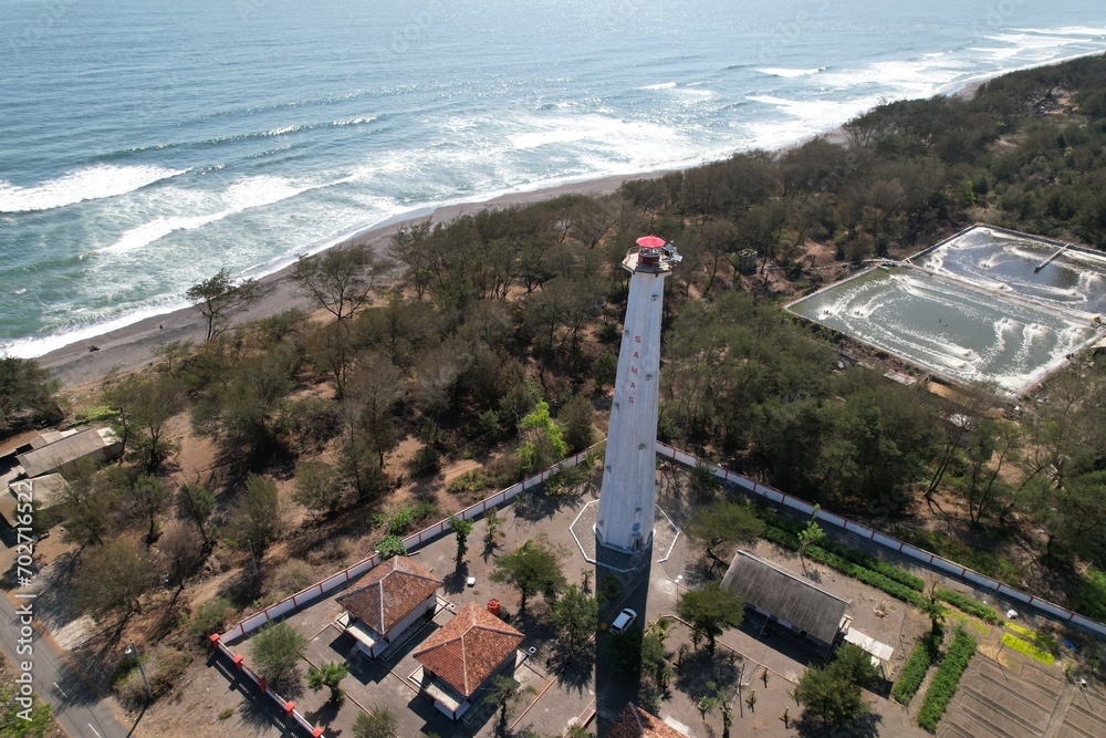 Stock-Foto „aerial view of white-walled lighthouse. A lighthouse is a ...