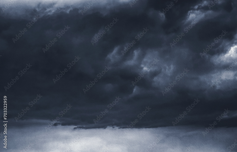 Stock-Foto „Dark storm clouds with paper texture style. The overcast ...