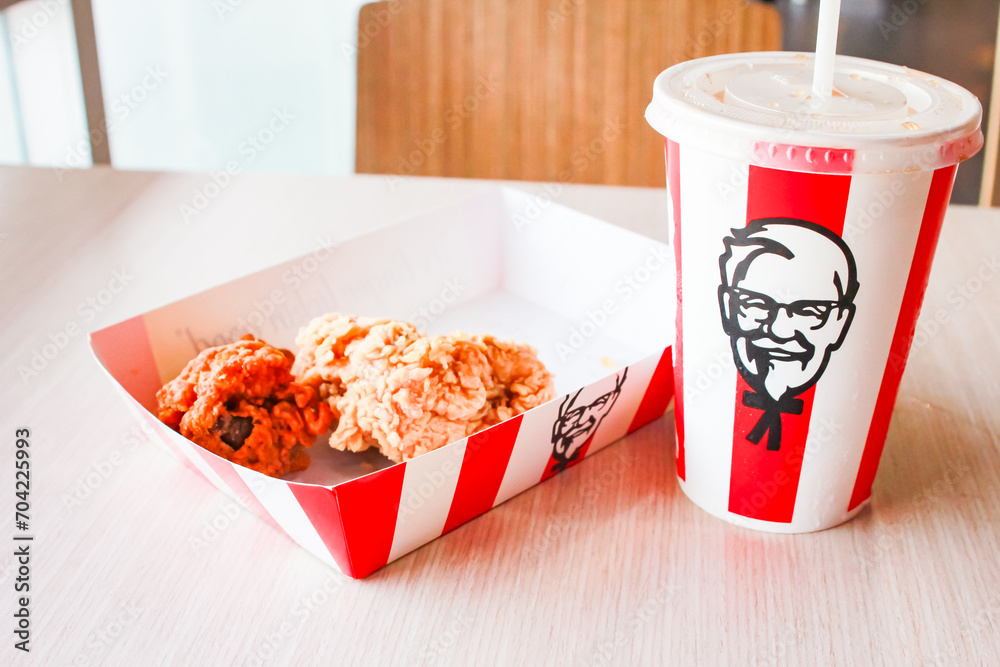 Bangkok, Thailand - January 07 2024 - Two pieces of KFC fried chicken ...