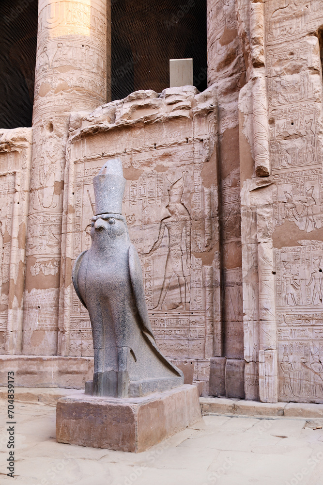 Granite statue of God Horus falcon at entrance Temple of Horus, Edfu ...