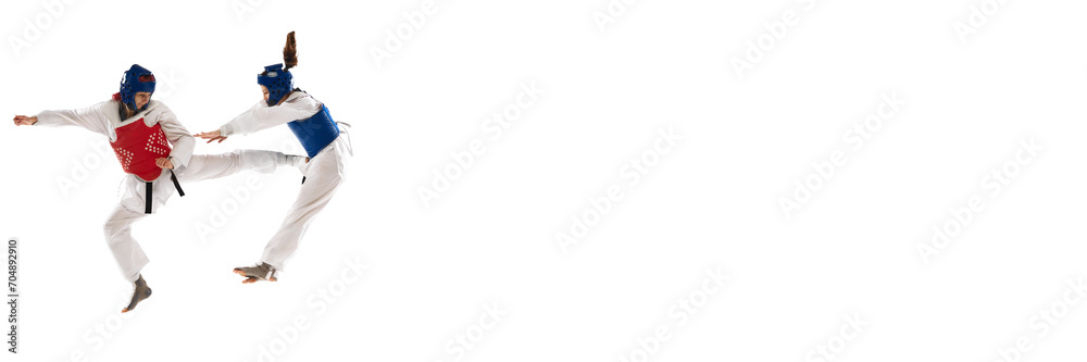 Leg powerful kick. Young girls training, practicing taekwondo stunts ...