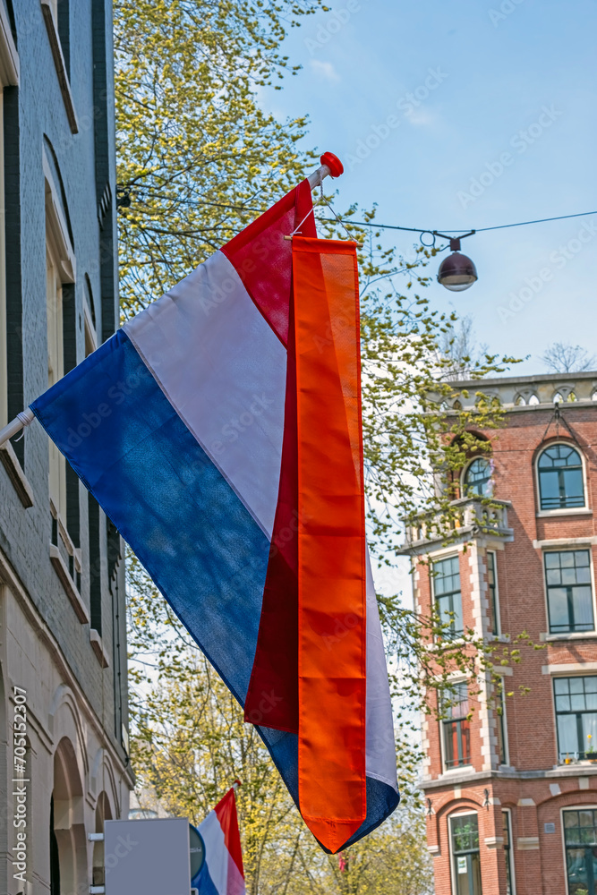 Stock-Foto „Dutch flag against a medieval facade from a house in ...