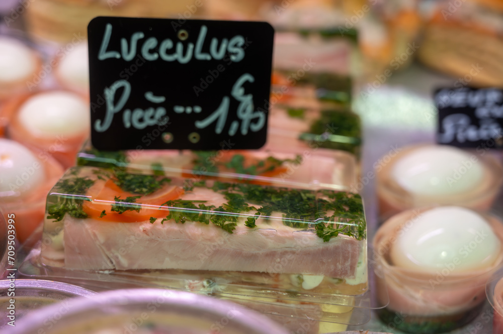 Assortment of meat on weekly food market in France, English translation ...