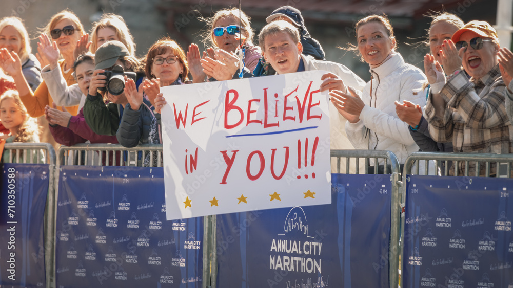 Marathon Supporters Waving at Their Loved Ones During a Sprint ...
