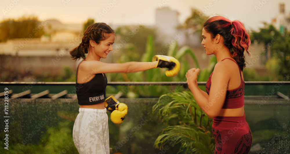 Indian Asian Hindu gen z young woman teach teen girl sport class learn ...