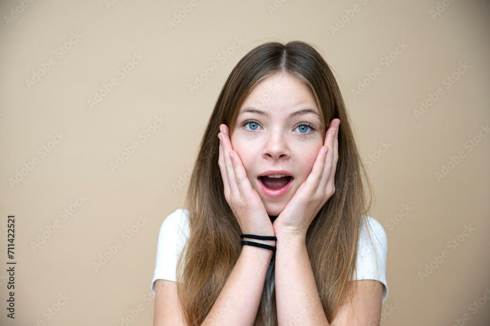 beautiful, cool, cute tween, teenager girl with long hair is posing in ...