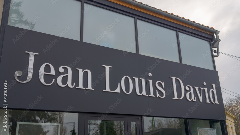 Jean Louis David sign text and brand logo france facade of hairdresser ...