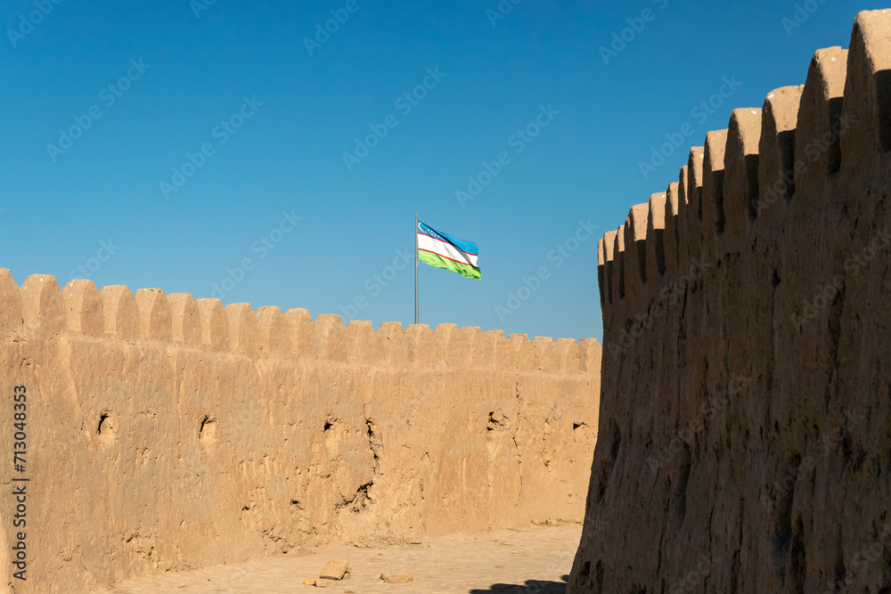 Foto de Stock Flag of Uzbekistan in Khiva, an age-old city along the ...