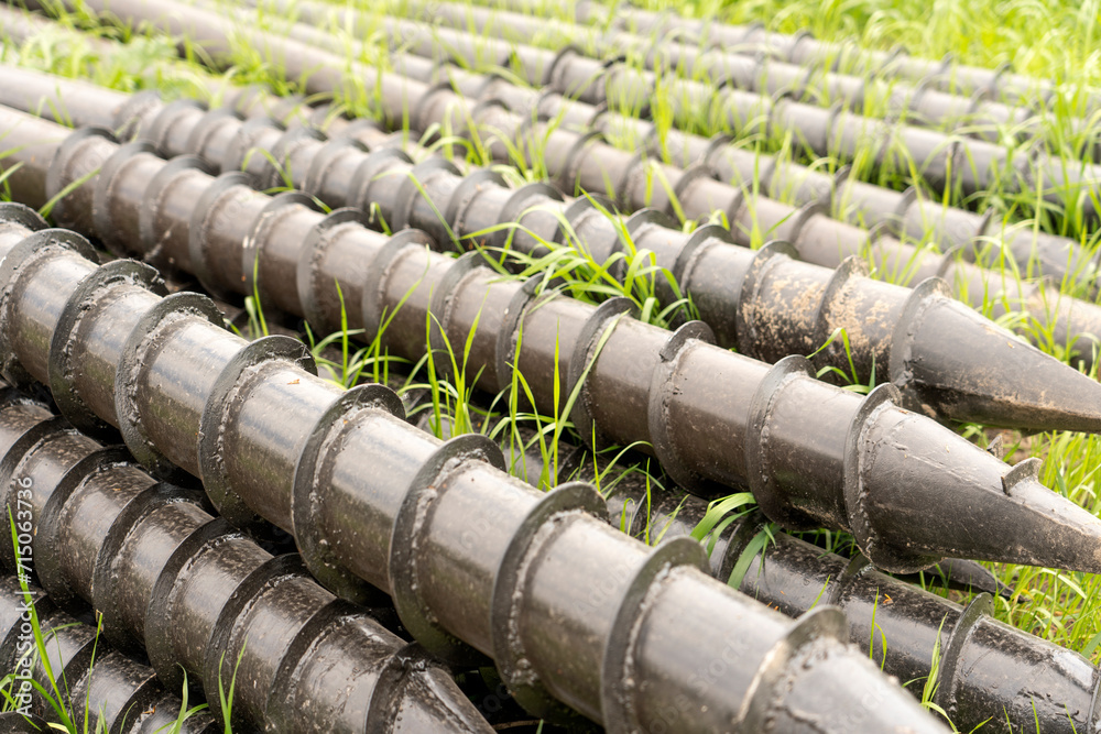 Screw piles for terrace foundations. Geo screws are steel round ...