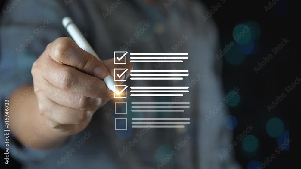 Businessman using pen to tick mark for check review and approve virtual ...