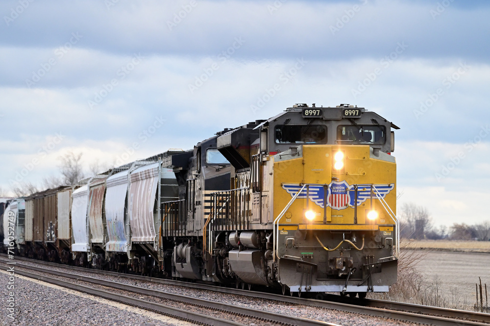 Two locomotives lead a Union Pacific Railroad freight train through ...